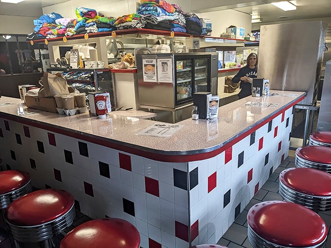 The counter where regulars become family and first-timers become regulars after just one perfectly cooked meal.