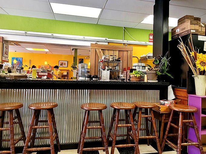 Where the magic happens. Those wooden stools aren't just for sitting—they're front-row tickets to a plant-based culinary show worth applauding.
