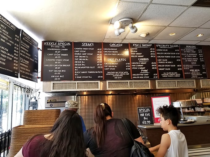 The ordering counter might not be fancy, but it's the gateway to carnivorous happiness where important life decisions are made daily.