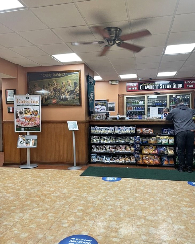 The pickup counter—where hopes and dreams materialize in the form of paper-wrapped sandwiches and the air smells of possibility.