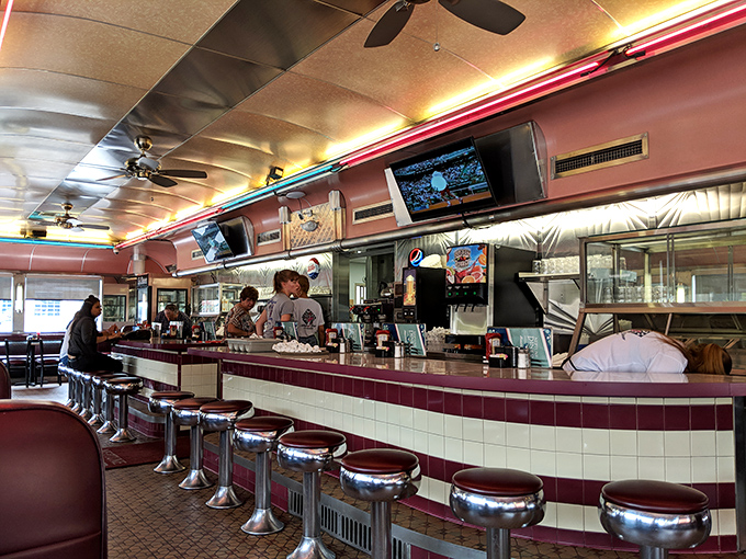 Chrome stools and friendly faces create the perfect stage for Lancaster's most beloved culinary theater experience.