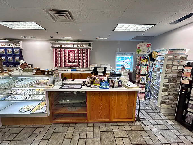 Behind this unassuming counter, pastry dreams come true. The bakery case: where willpower goes to die a delicious death.