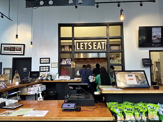 "LET'S EAT" isn't just a sign—it's the most sensible command you'll gladly obey once you smell what's cooking behind that counter.