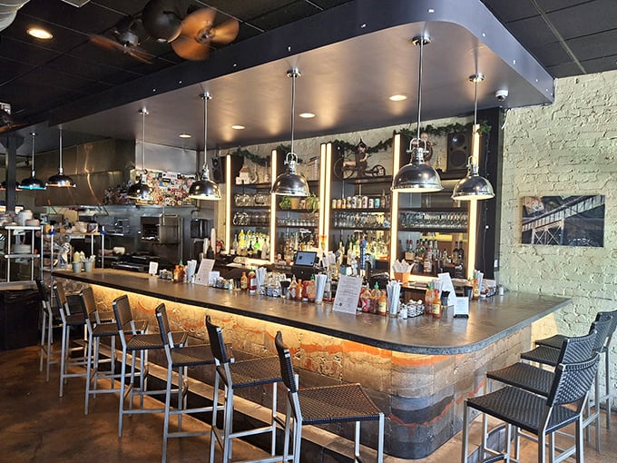 The bar at Lulu's isn't just where drinks are made—it's command central for brunch operations and prime seating for solo diners.