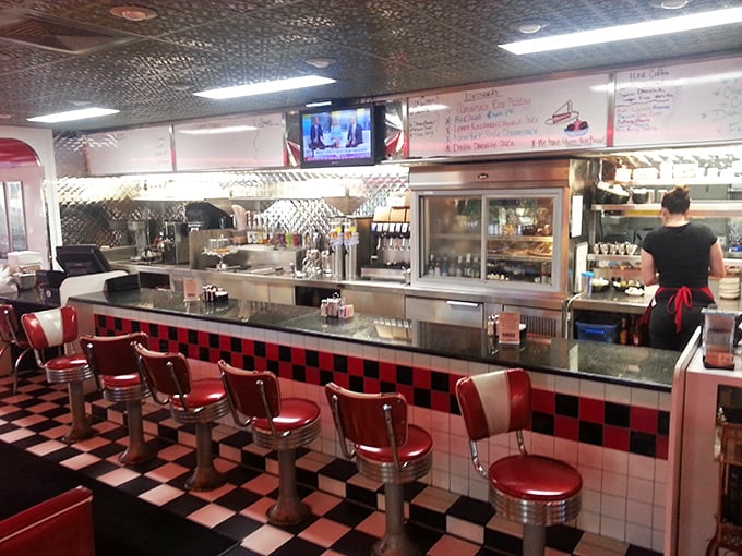 The counter—where diner magic happens. Grab a red stool and watch short-order choreography that would impress Broadway directors.