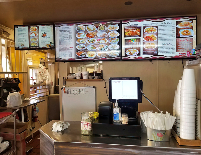 Where the magic happens—the ordering counter welcomes you with a handwritten "WELCOME" sign. No pretension, just genuine hospitality.