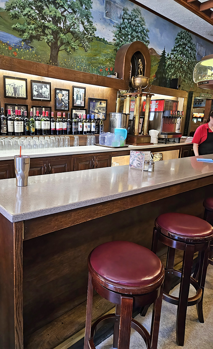 The bar area, with its worn wooden stools and trophy displays, feels like the neighborhood's living room – comfortable and welcoming.