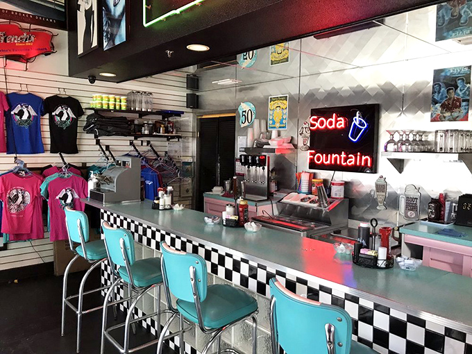 The counter seats offer front-row tickets to the short-order show, where breakfast dreams come true under the watchful gaze of rock 'n' roll legends.