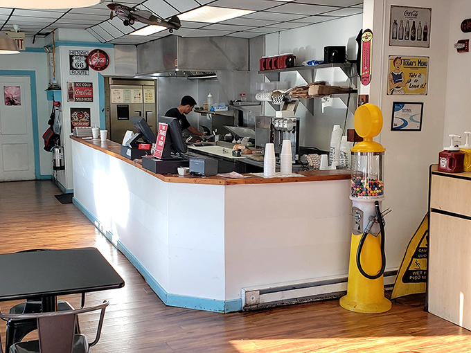 Where the magic happens. The open kitchen setup lets you watch your burger journey from raw patty to plate.