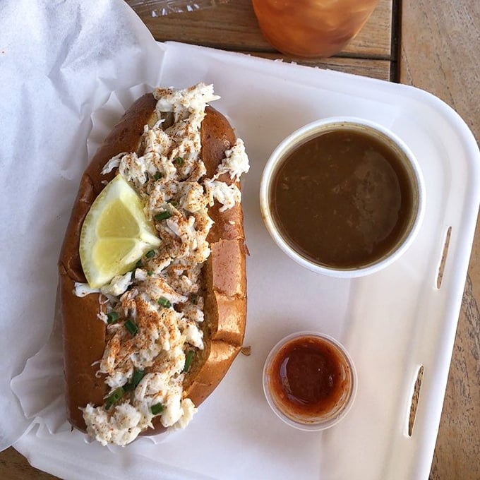 This crab roll with a side of bisque isn't just lunch—it's a coastal vacation on a tray, no sunscreen required.