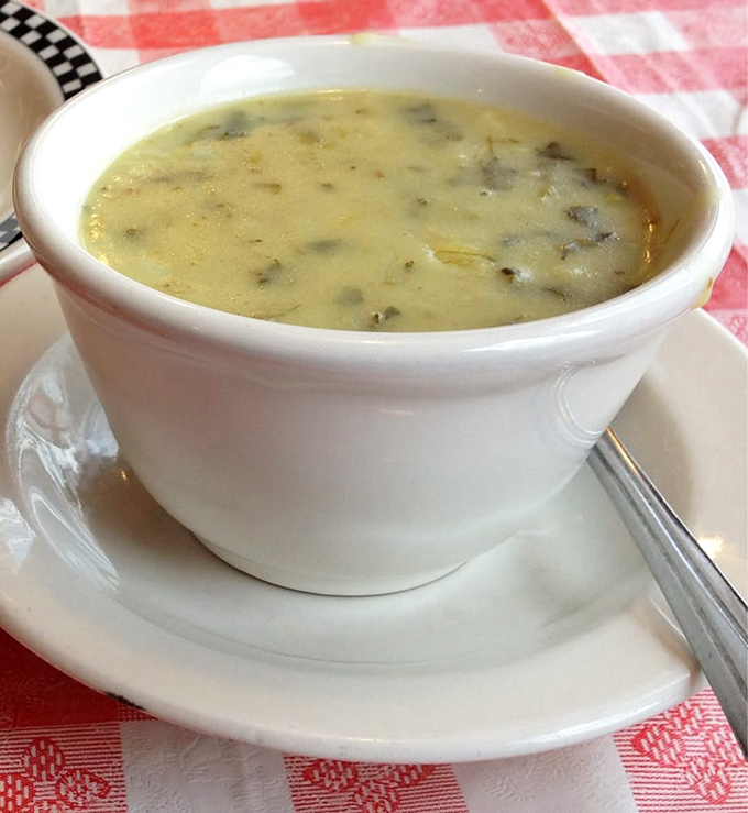 A bowl of creamy soup that whispers, "Cancel your afternoon plans – you'll want to savor every spoonful of this comfort."