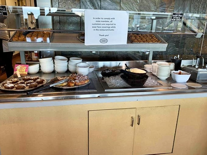 The dessert section – where diet plans go to die and happiness is served under heat lamps. Worth every calorie-counting moment of guilt.