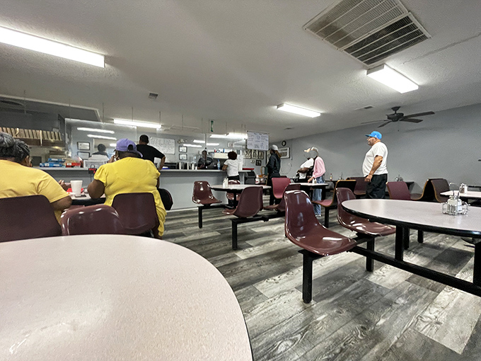 The dining room during service—where strangers become neighbors and everyone shares at least one thing in common: excellent taste in restaurants.