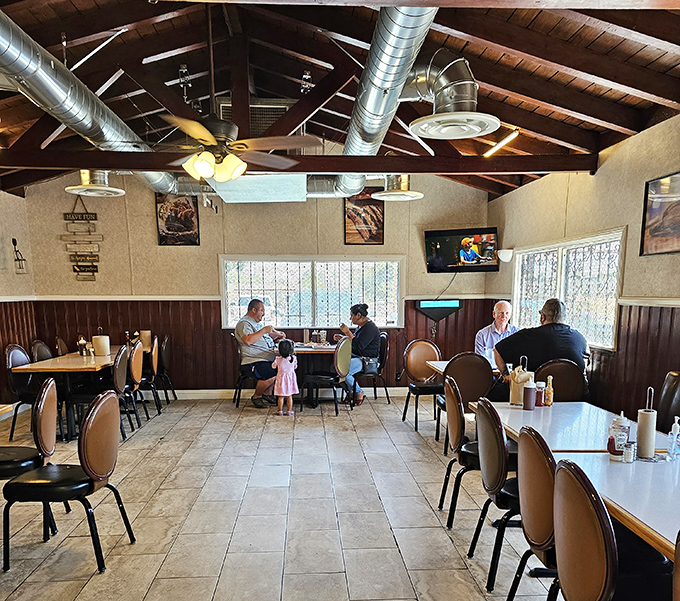 Real people enjoying real barbecue – the kind of authentic dining experience that creates lifelong food memories.