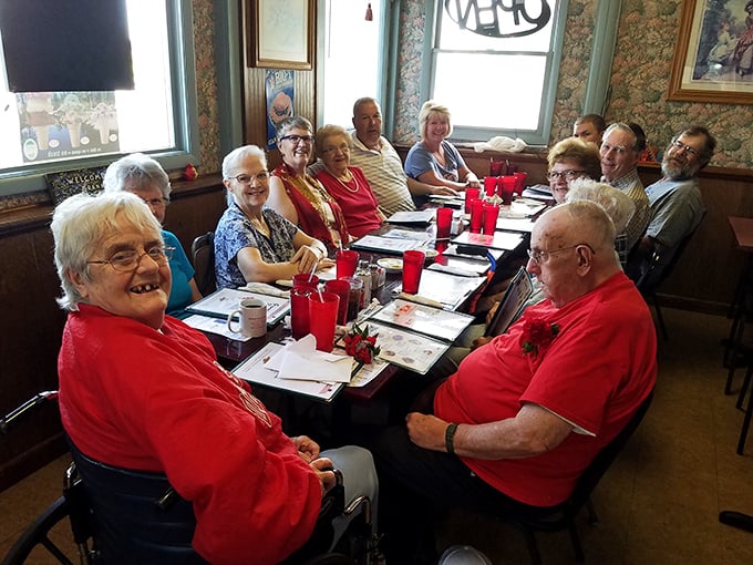 The true heart of any great restaurant – its people. Regulars gathering for food, friendship, and the kind of laughter that makes you live longer.