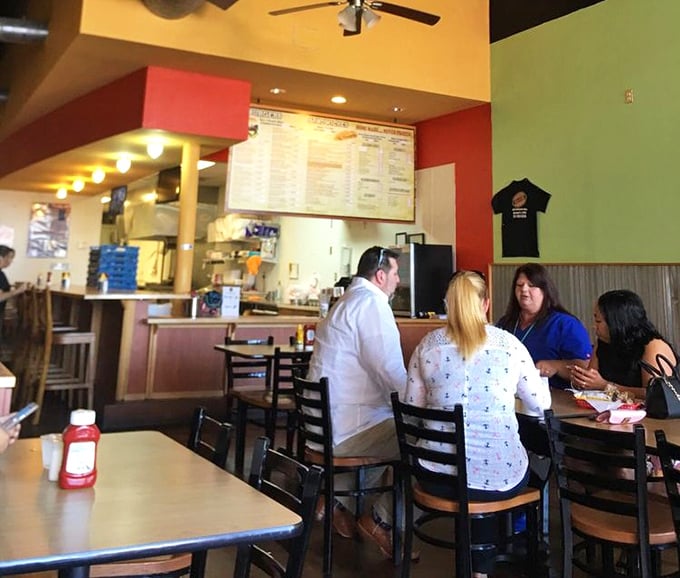 Where strangers become friends over shared burger enthusiasm. The universal language of "mmm" transcends all barriers.