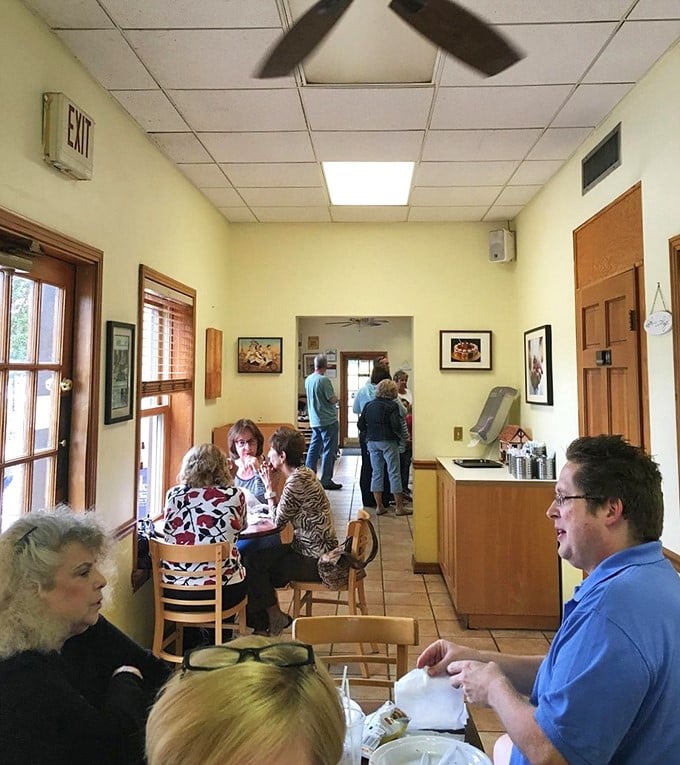 The dining room buzzes with the universal language of food appreciation—forks diving, conversations flowing, and not a crumb wasted.