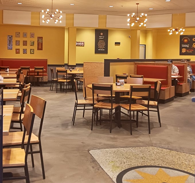 The dining room feels like the breakfast equivalent of a warm hug—spacious enough for privacy, cozy enough for comfort.
