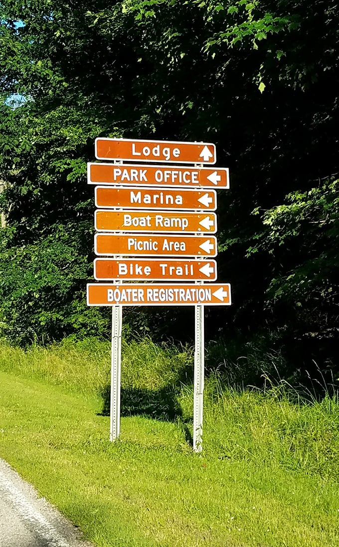 The most honest relationship counselor—directional signage that never says "you should just know where you're going" when you're clearly lost.