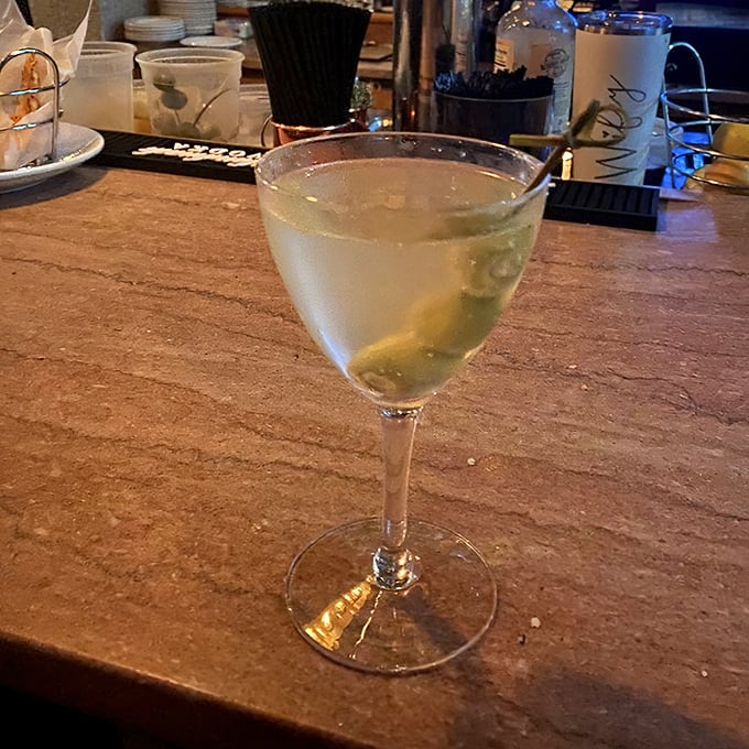 Crystal clear with just a hint of olive—the dirty martini that makes you wonder why you ever order anything else.