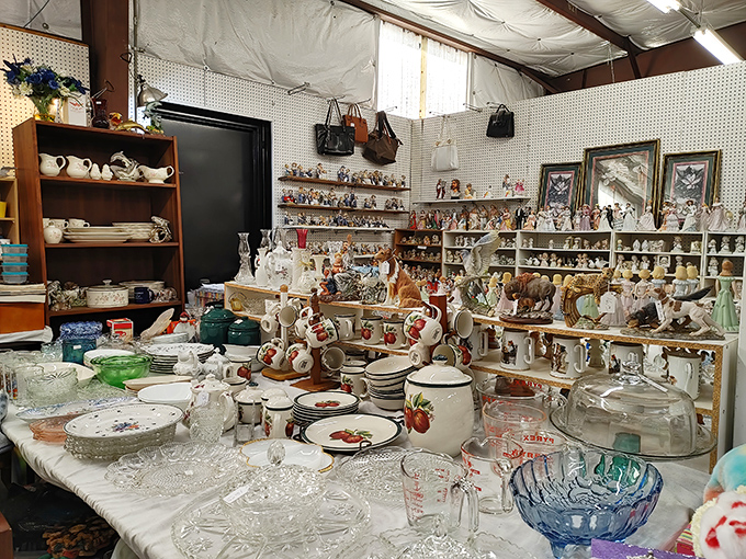 This booth is a ceramic wonderland where figurines, dishware, and glassware create a time capsule of American domestic life across decades.