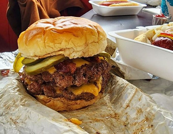 Not so much a burger as a monument to American excess—in the best possible way. Worth every napkin you'll need afterward.