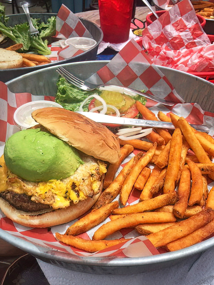 A burger that doesn't just satisfy hunger—it abolishes it. Served with fries so perfect they deserve their own fan club.