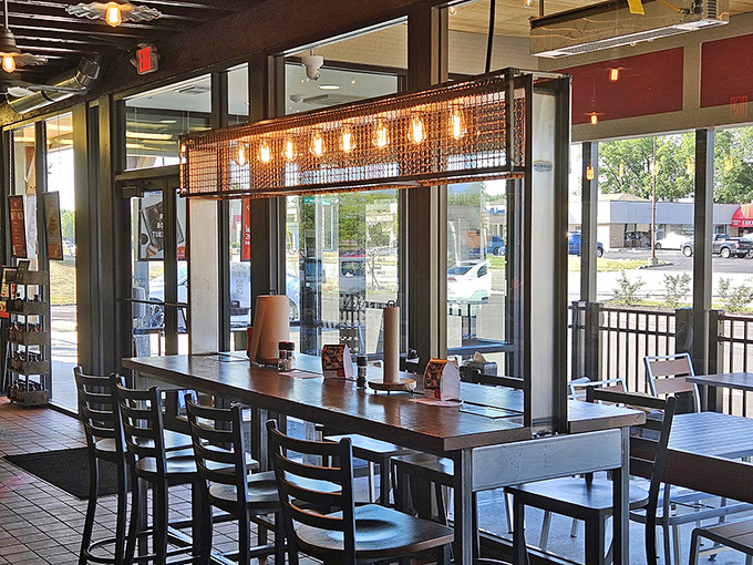 The ordering counter—where barbecue dreams begin their journey to reality. Note the barn-door aesthetic that whispers "authentic."