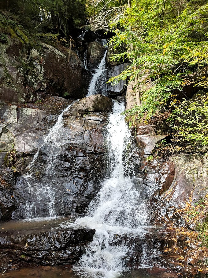Nature's own water feature cascades through the rocks, providing the perfect soundtrack for hikers who've earned their post-trail feast in town.