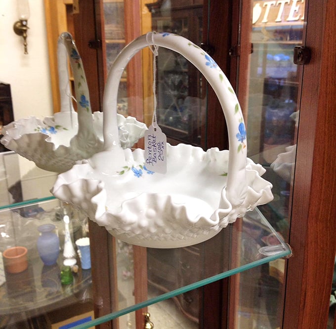 This delicate Fenton basket isn't just milk glass—it's someone's wedding gift from 1952 finding its second chapter in your china cabinet.