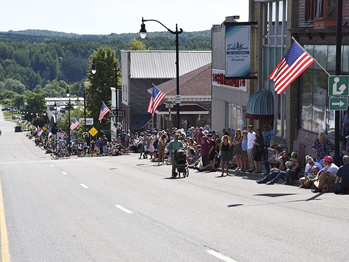 Parade day in Crystal Falls transforms Main Street into the social event of the season, where finding a good viewing spot is serious business.