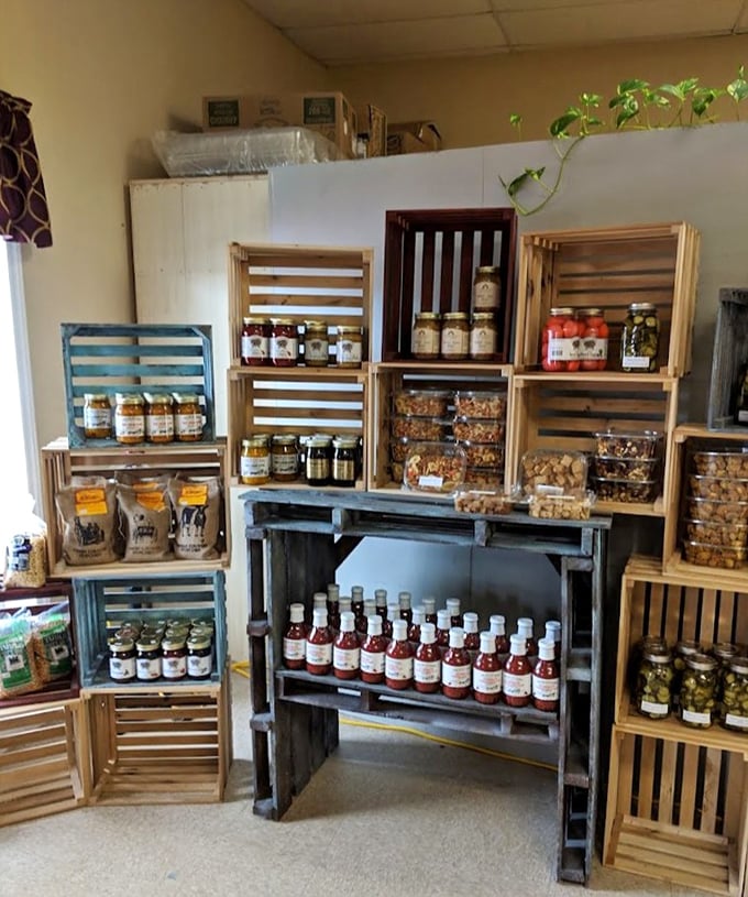 This isn't just a food display – it's a shrine to preserved goodness. Those wooden crates could tell stories of Amish kitchens and time-honored recipes.
