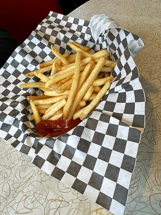 French fries that achieve that mythical balance—crispy exterior, fluffy interior, and just enough salt to make you forget your doctor's advice.