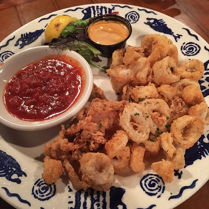 Perfectly fried calamari rings arrive golden and tender, proving that simple preparations often taste the best.