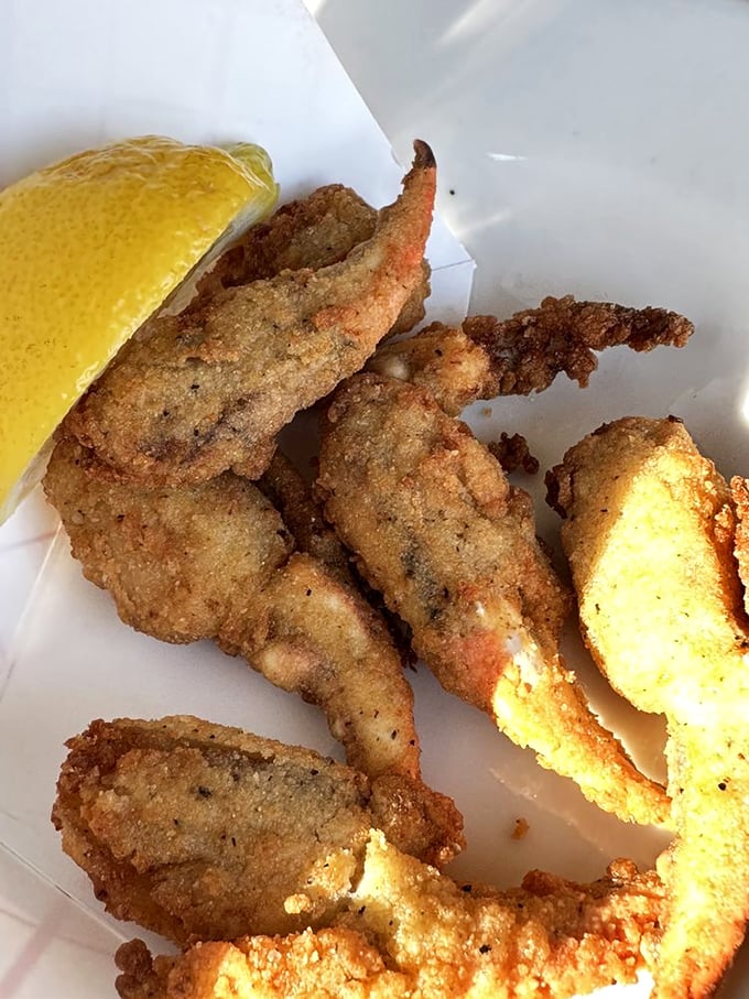 Fried crab claws—the unsung heroes of the appetizer world. Crunchy, sweet, and the perfect excuse to order "just one more round" of cocktails.