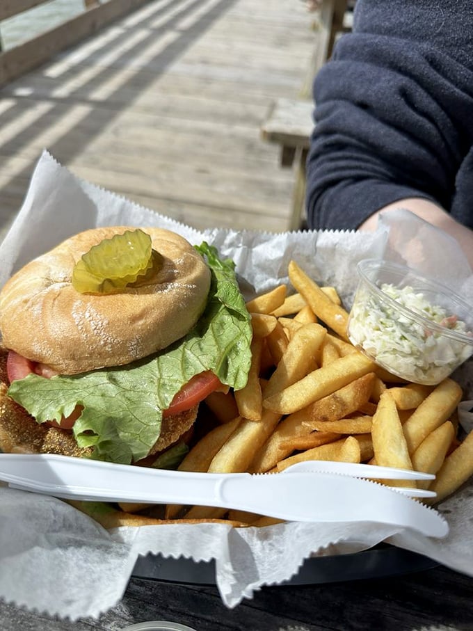 The sandwich that launched a thousand return trips – a perfectly fried fish filet on a pillowy bun with crisp lettuce and golden fries.