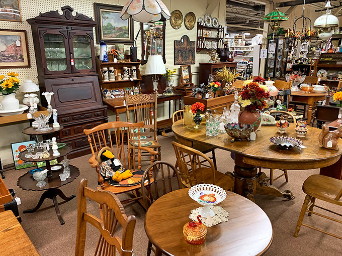 Pull up a chair – or twelve! This furniture vignette showcases the warm patina of well-crafted wooden pieces that have witnessed decades of family gatherings.