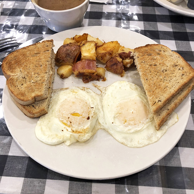 The classic American breakfast: two eggs staring up at you like eyes, saying "Good morning! We're about to make your day significantly better."