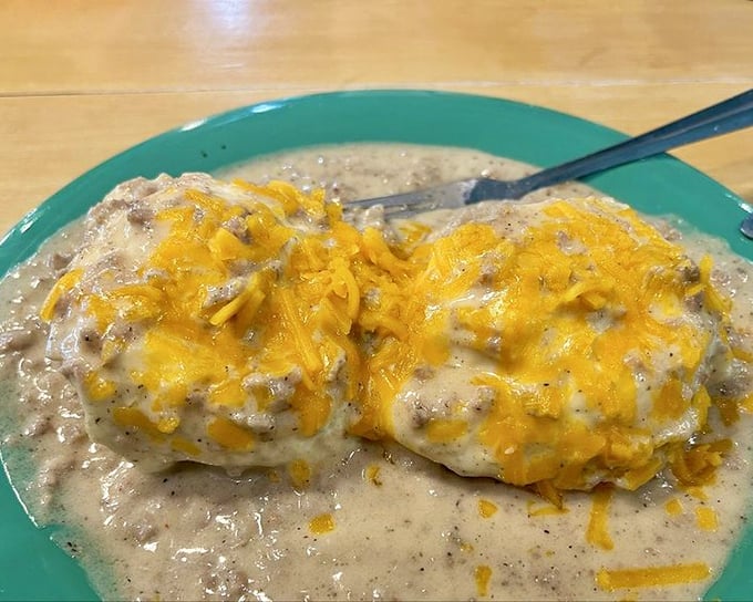 Country-style benedict drowning in cheesy hollandaise sauce that could cure any case of the blues.