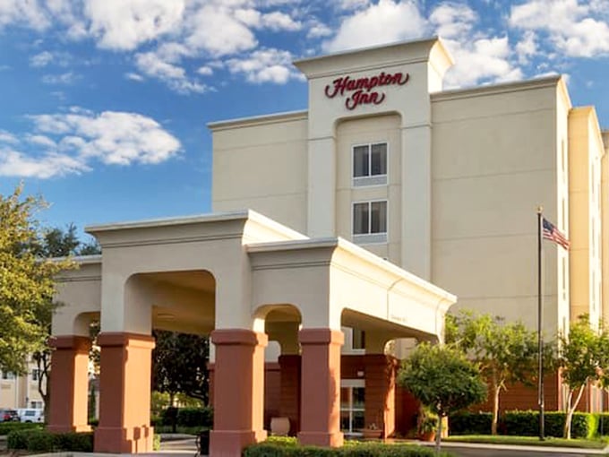 Even the Hampton Inn embraces Florida's architectural identity—because chain hotels here know they're in a town with standards.