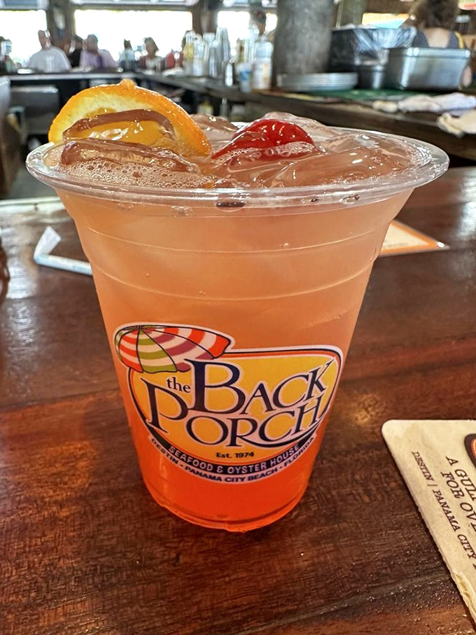 This vibrant cocktail isn't just a drink—it's liquid sunshine with fruit garnishes that practically demands a sunset photo opportunity.