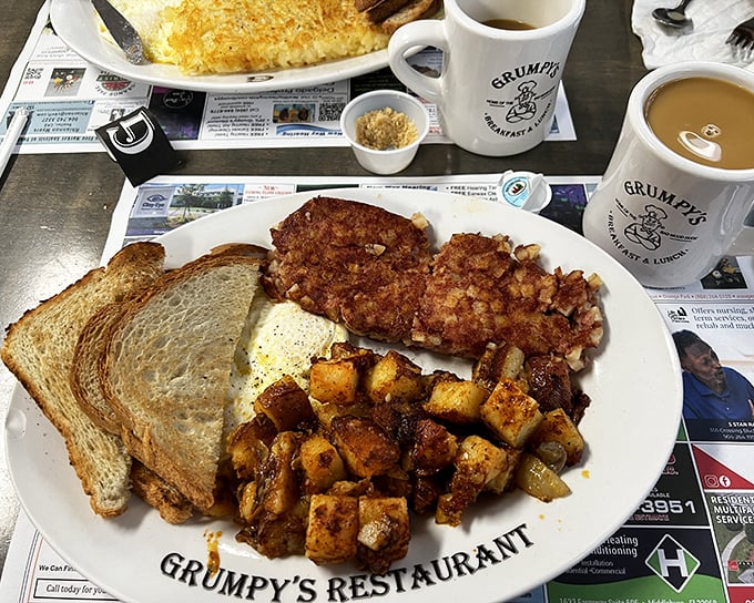 Breakfast perfection on a plate. That crispy golden toast and those perfectly seasoned home fries prove someone in the kitchen really cares.