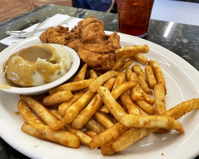 Chicken tenders, mashed potatoes, and gravy—comfort food that doesn't need a backstory, just a fork and your undivided attention.
