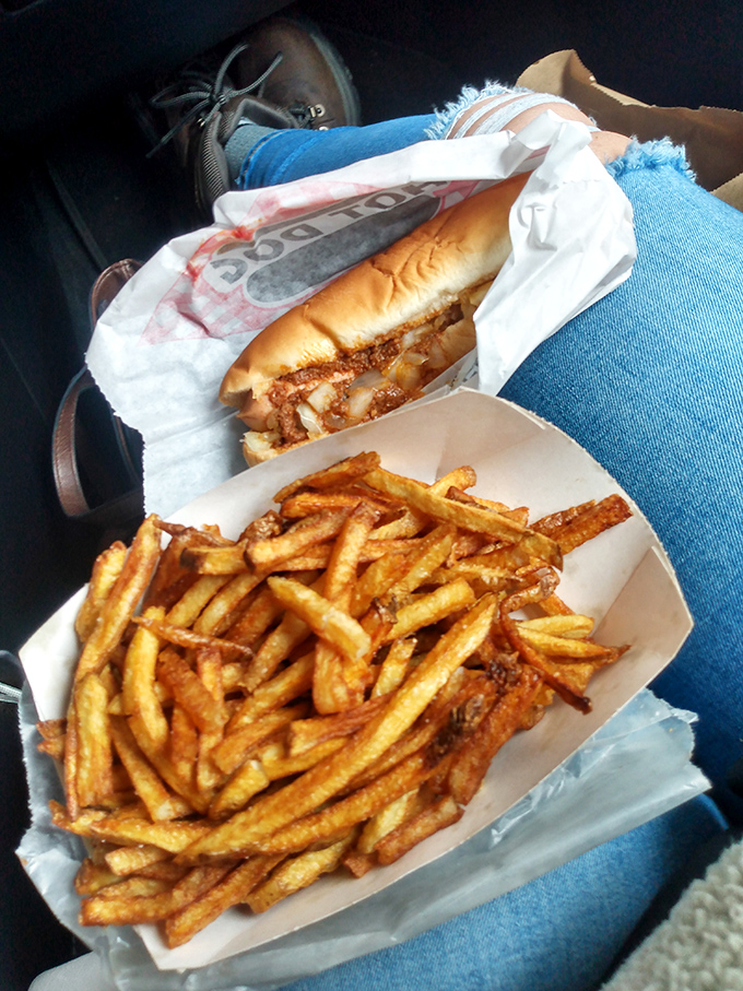 Car dining at its finest—the steering wheel becomes your table and every bite tastes better with a dashboard view.