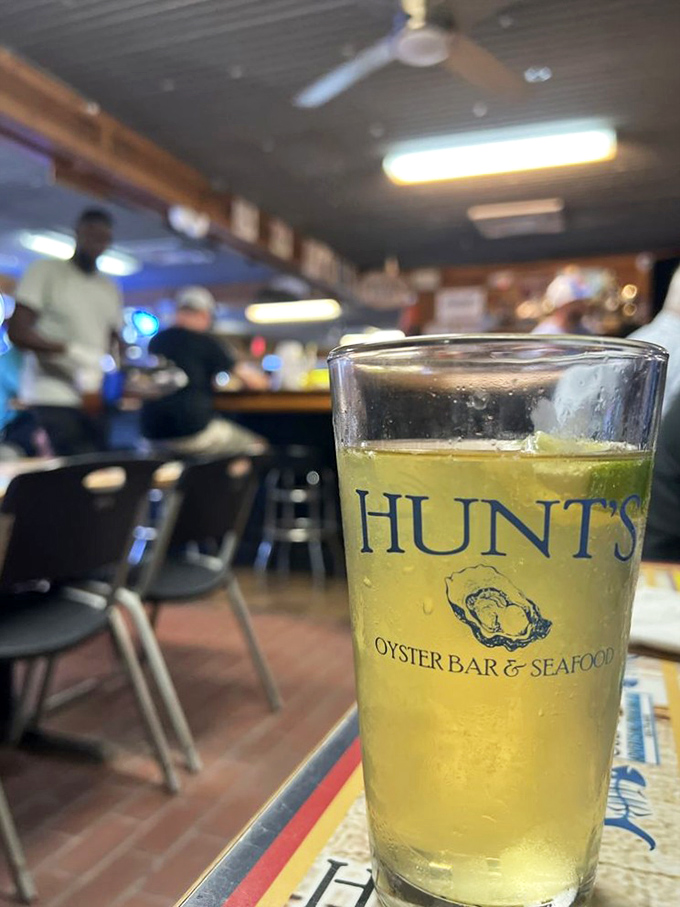 A frosty glass of beer bearing the Hunt's logo—because sometimes the perfect beverage pairing is simply whatever's cold and refreshing.
