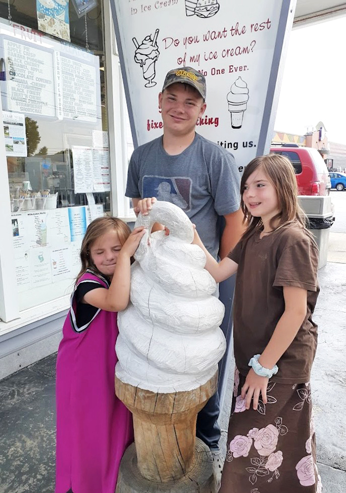 The ice cream display window – where children press their noses and adults mentally calculate how many flavors they can reasonably try.