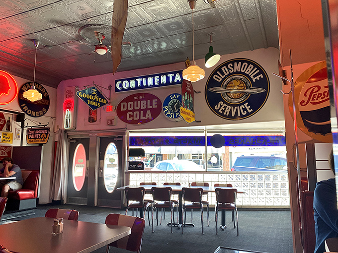 Vintage signs for Continental Tires and Oldsmobile Service create a museum of Americana where the exhibits come with side orders and bottomless coffee. 