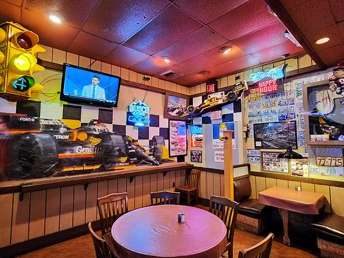 Where neon signs, traffic lights, and racing memorabilia create the perfect backdrop for serious eating business.