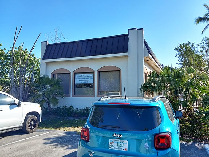 Unassuming island architecture hiding wellness treasures within. The kind of place that heals you before you even walk through the door.