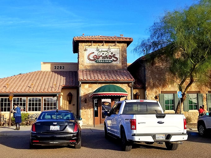 Johnny Carino's stone and stucco façade brings a touch of Tuscan charm to the desert, promising pasta paradise within.